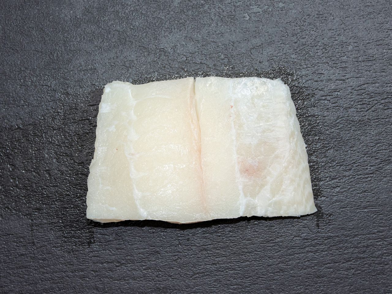 Weißes Heilbuttfilet: Exklusiver Speisefisch aus den Nordmeeren